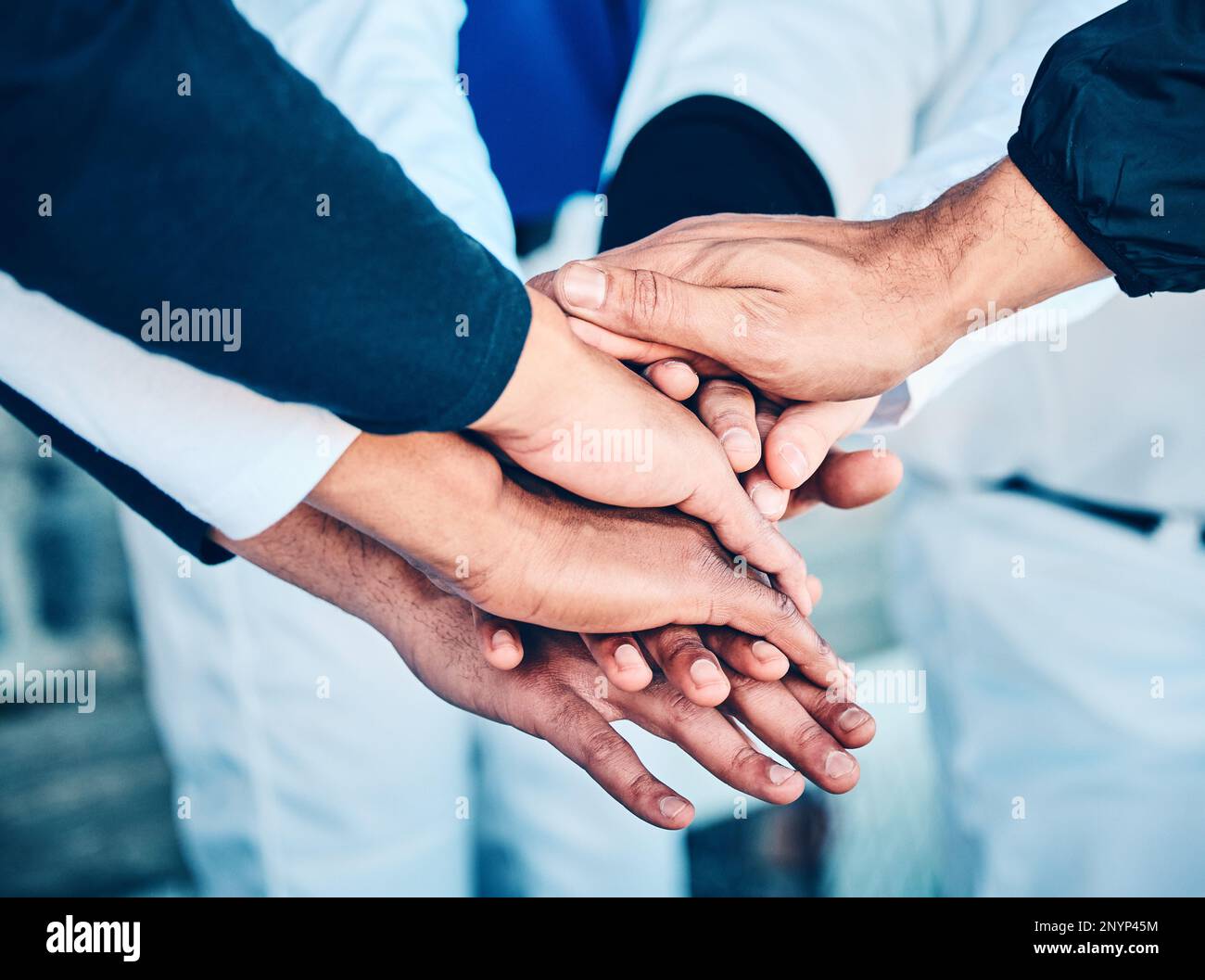 Closeup, hands and team with support, motivation and fitness for game ...