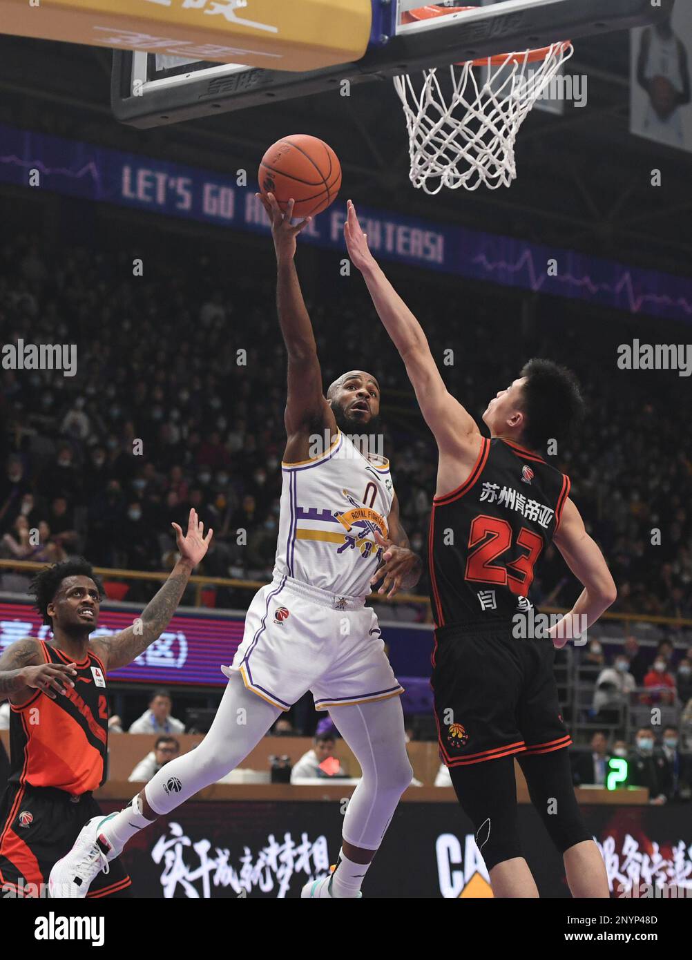 Tianjin, China. 2nd Mar, 2023. Trae Golden (C) of Beijing Royal ...