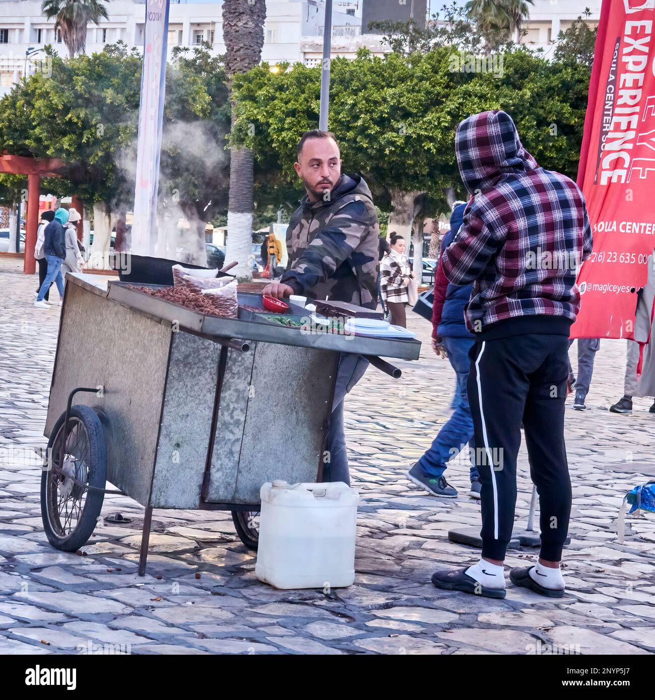 Sousse, Tunisia, January 30, 2023: Handcart in which roasted almonds ...