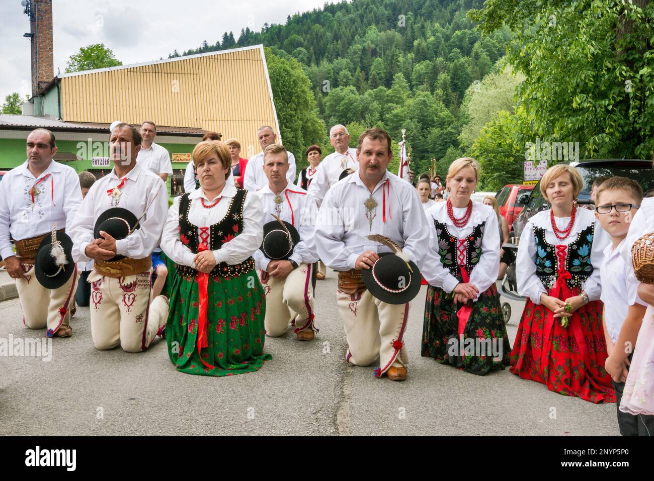 Village worshipers in traditional folk clothes, Corpus Christi ...
