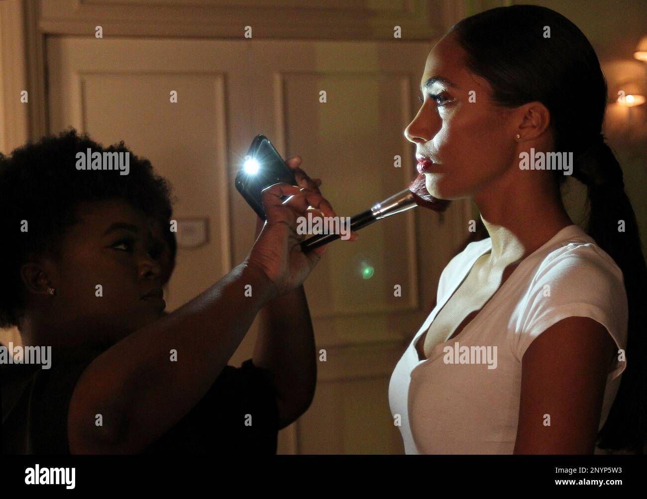 On Sunday, June 11, 2017 Brenda Francois guides the with the light on ...