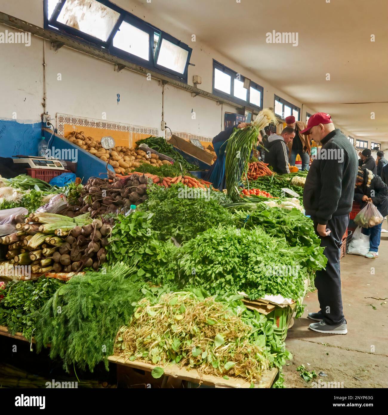 Sousse, Tunisia, February 2, 2023 Vegetable stand with leek, radish and ...