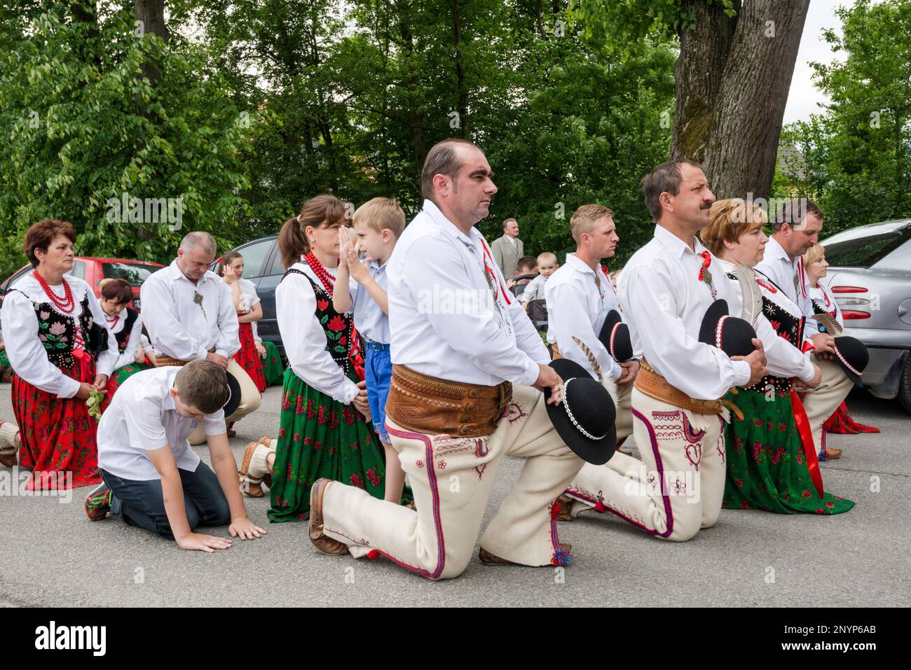 Village worshipers in traditional folk clothes, Corpus Christi ...