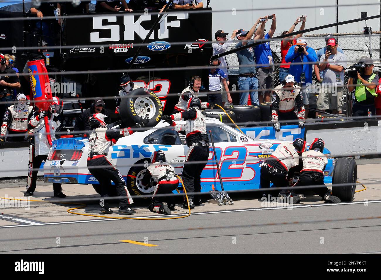 Brad Keselowski, SKF Ford Mustang makes a pit stop during the NASCAR ...