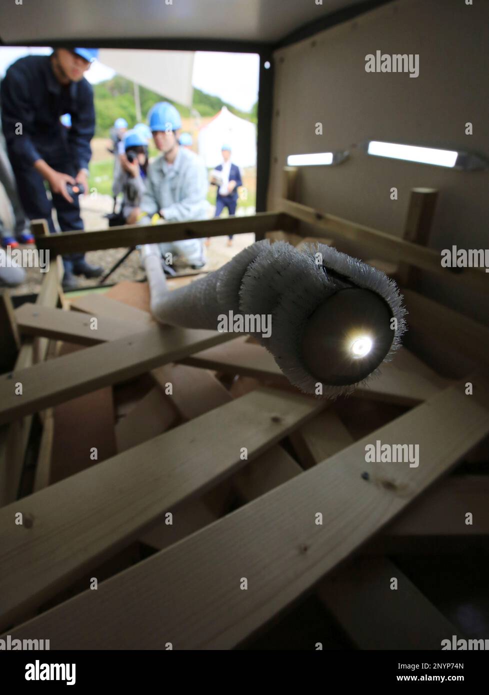 A snake-shaped robot, demonstrated by researchers of Tohoku University ...