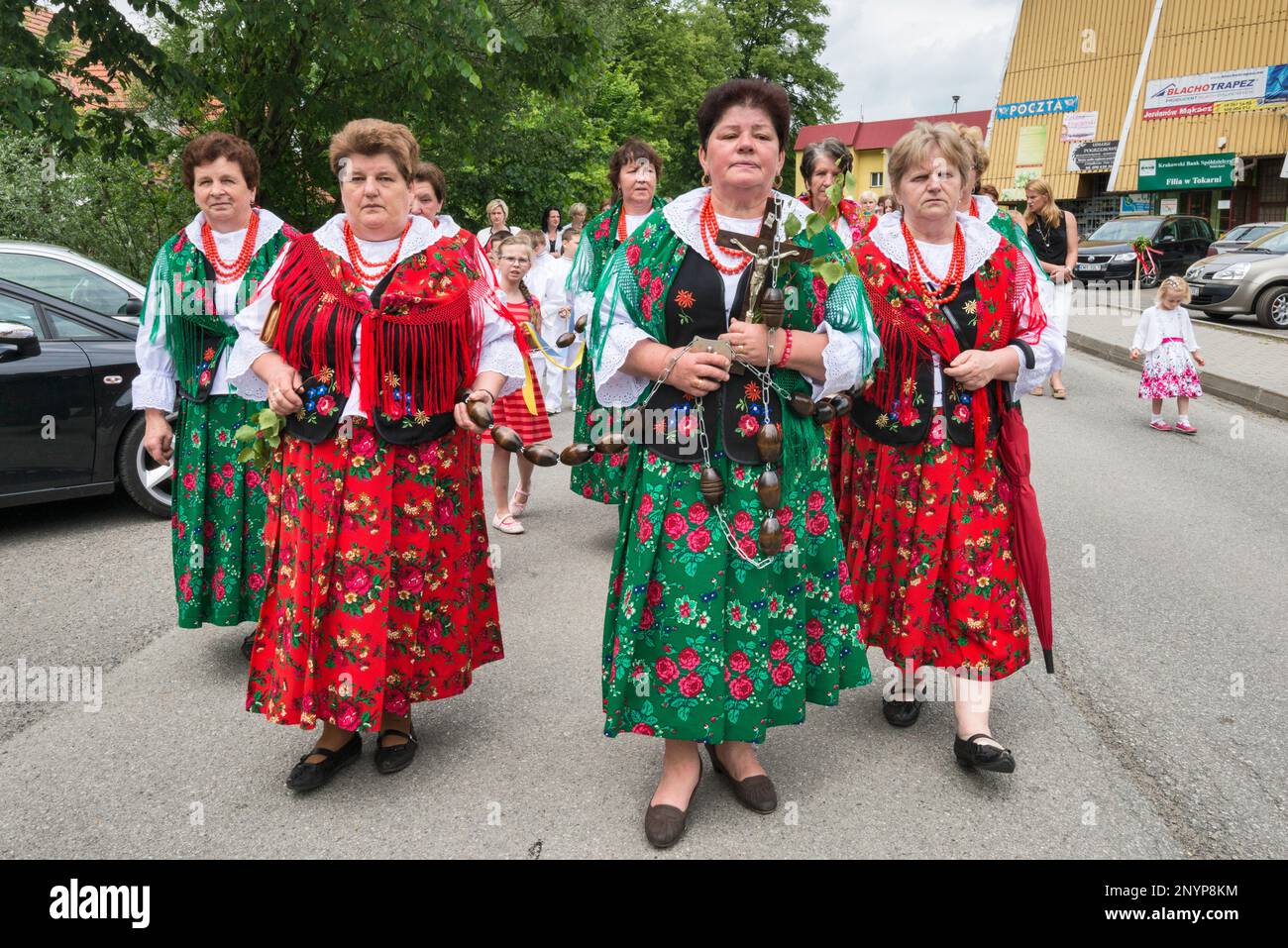Women in traditional folk clothes, Corpus Christi procession in ...
