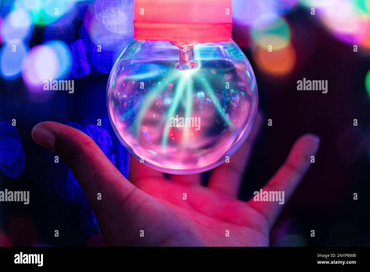 Hand Under Electrostatic Ball Induction Glow Ball Plasma Ball Purple ...