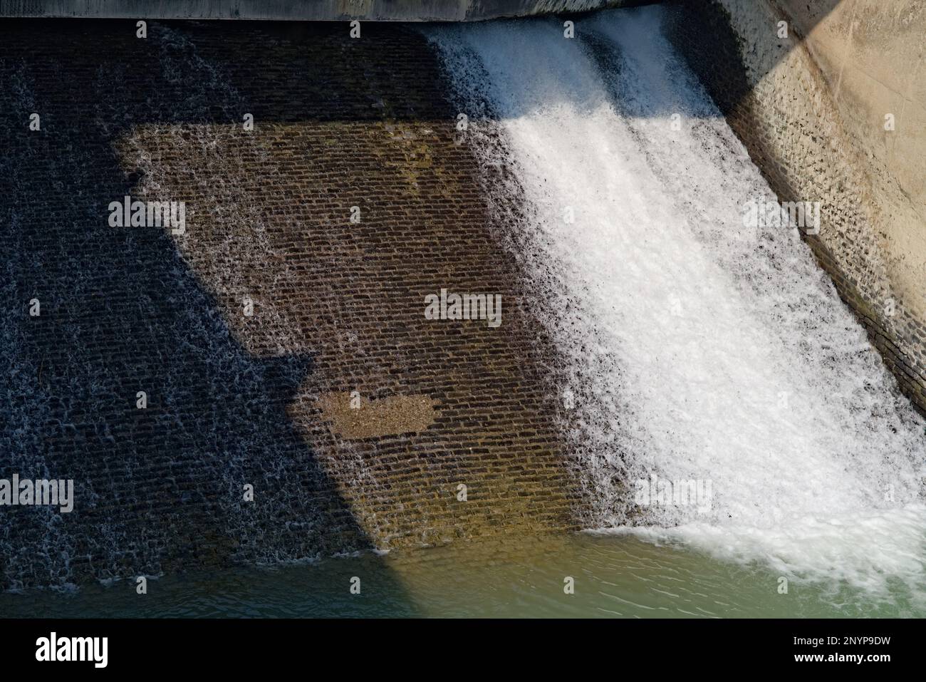 river dam controlling the flow of water through lock gates Stock Photo ...