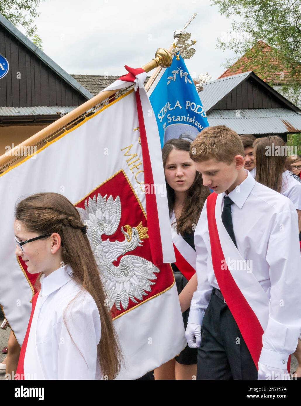 School children carrying a flag with Polish Eagle, Corpus Christi ...