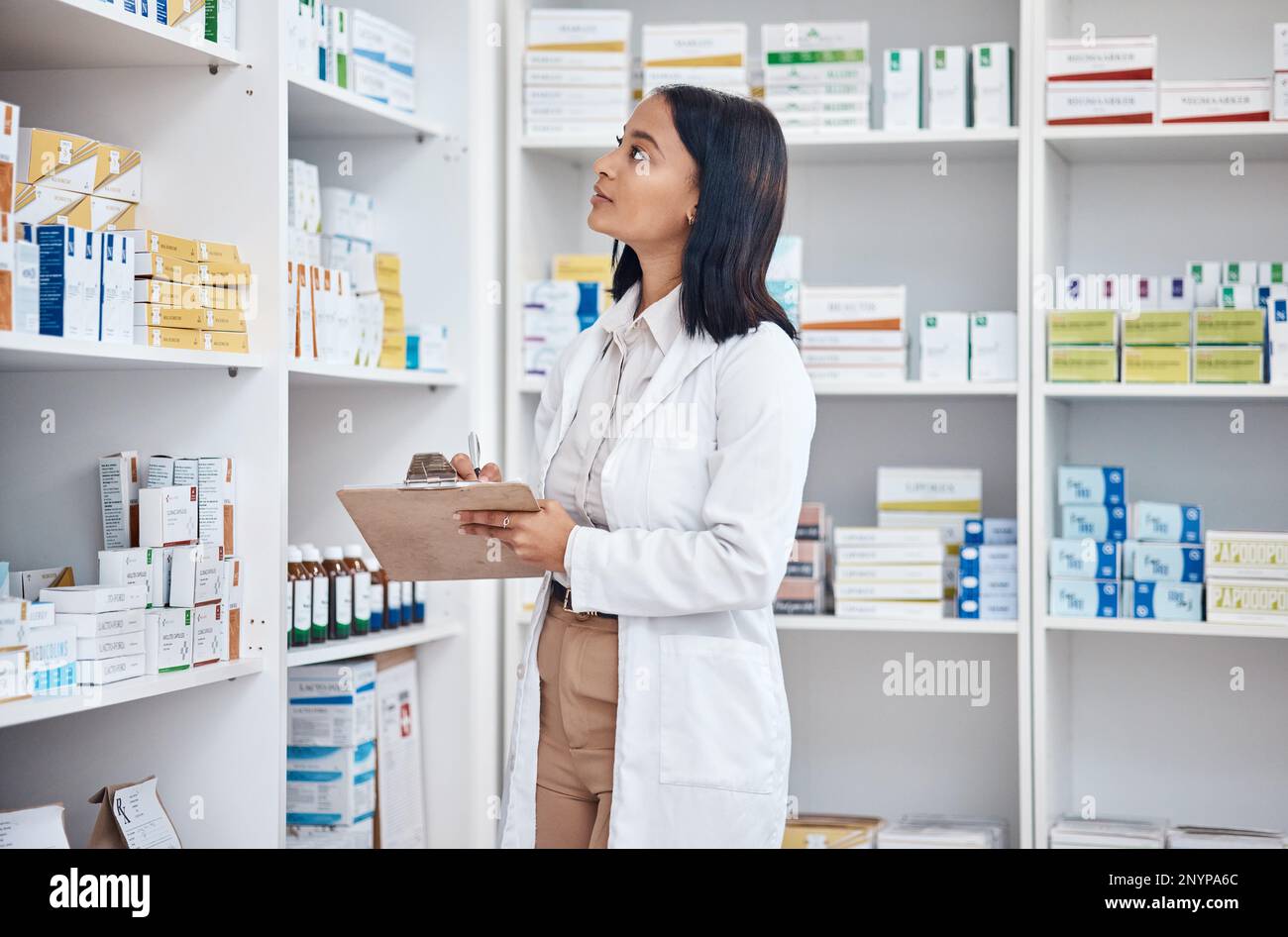 Pharmacy clipboard, product inventory and woman stock take in drugs ...