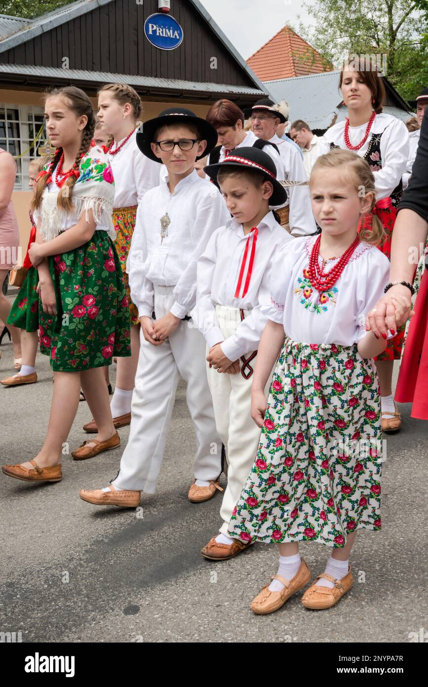Children in traditional folk clothes, Corpus Christi procession in ...
