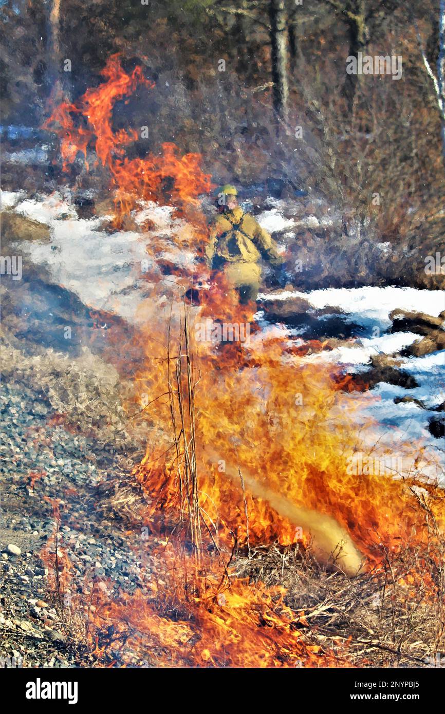 Kelly Grenquist with Colorado State University (CSU) oversees a ...