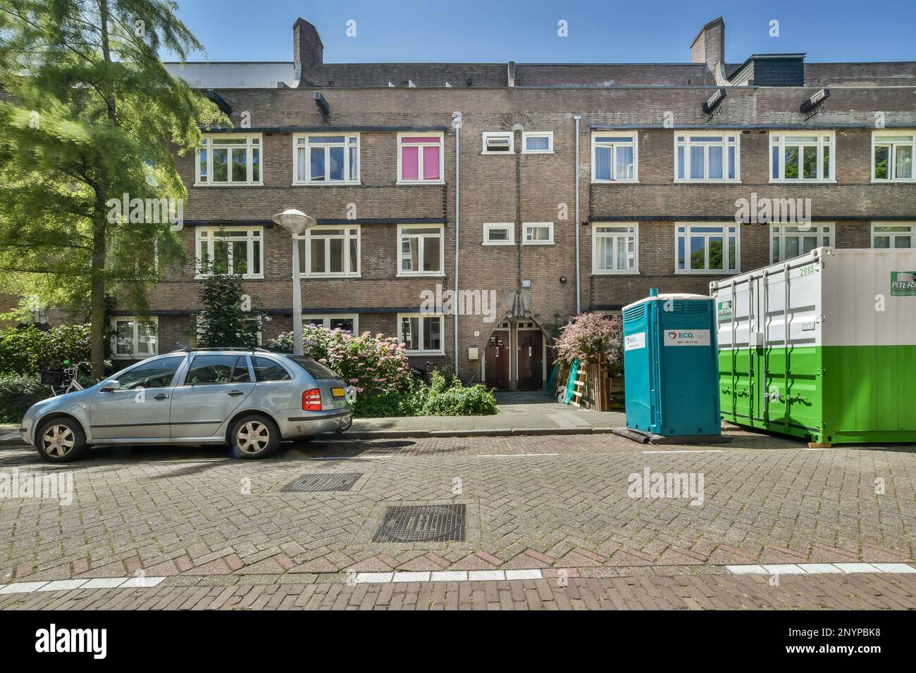 Amsterdam, Netherlands - 10 April, 2021: a car parked in front of a ...