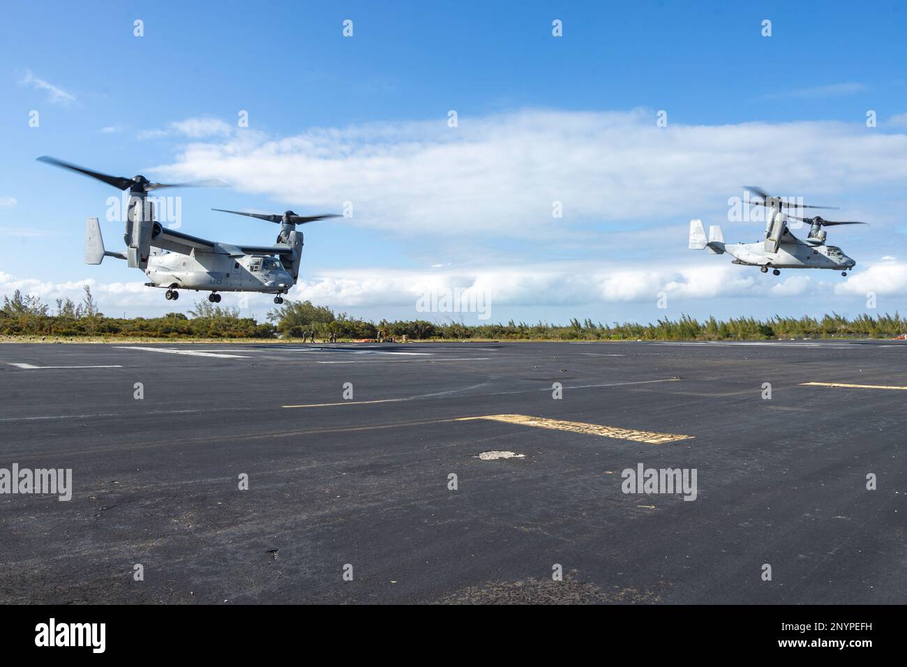 Two U.S. Marine Corps MV-22B Ospreys with Marine Medium Tiltrotor Squadron 161, Marine Aircraft ...