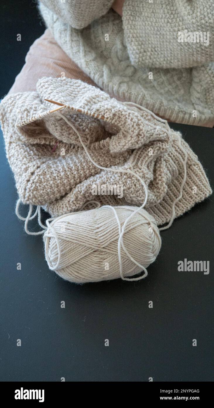 Knitting wool and sticks in close up Stock Photo - Alamy