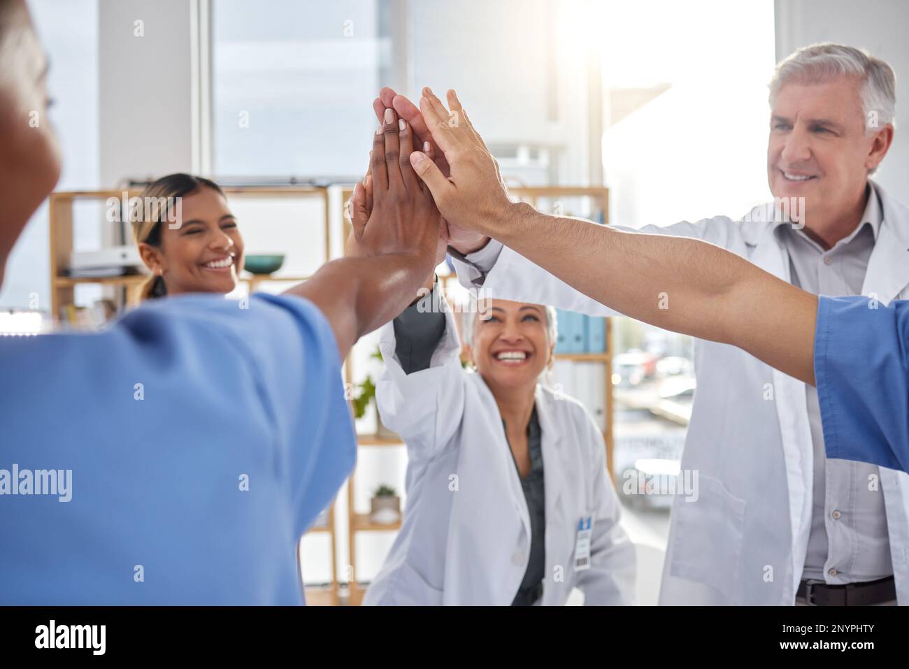 Success, high five or nurses in meeting for a strategy, goals or ...