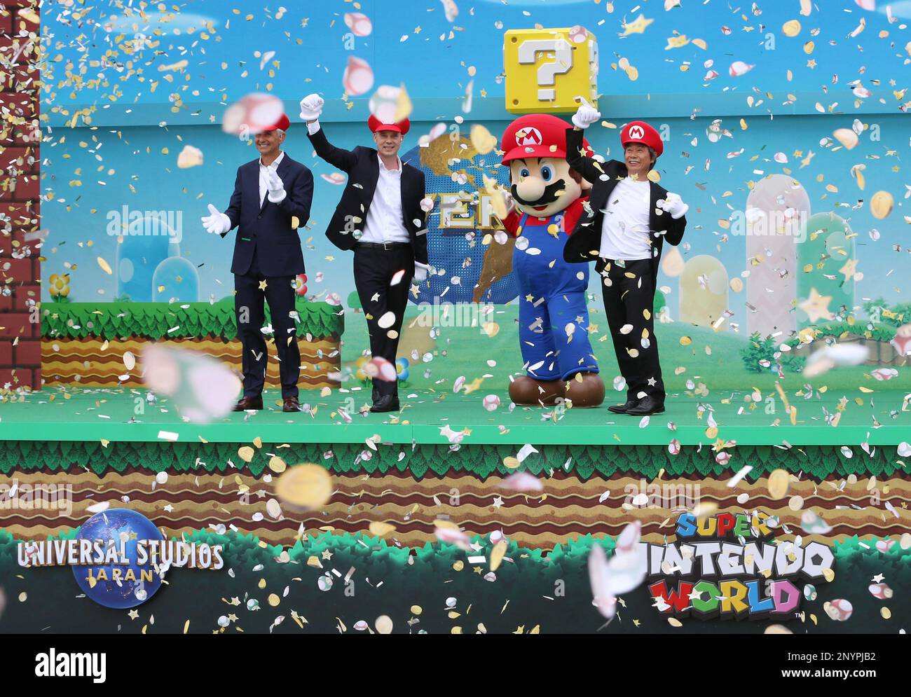 Nintendo’s iconic character Mario (2nd from R) and USJ Chief Executive Officer Jean-Louis ...