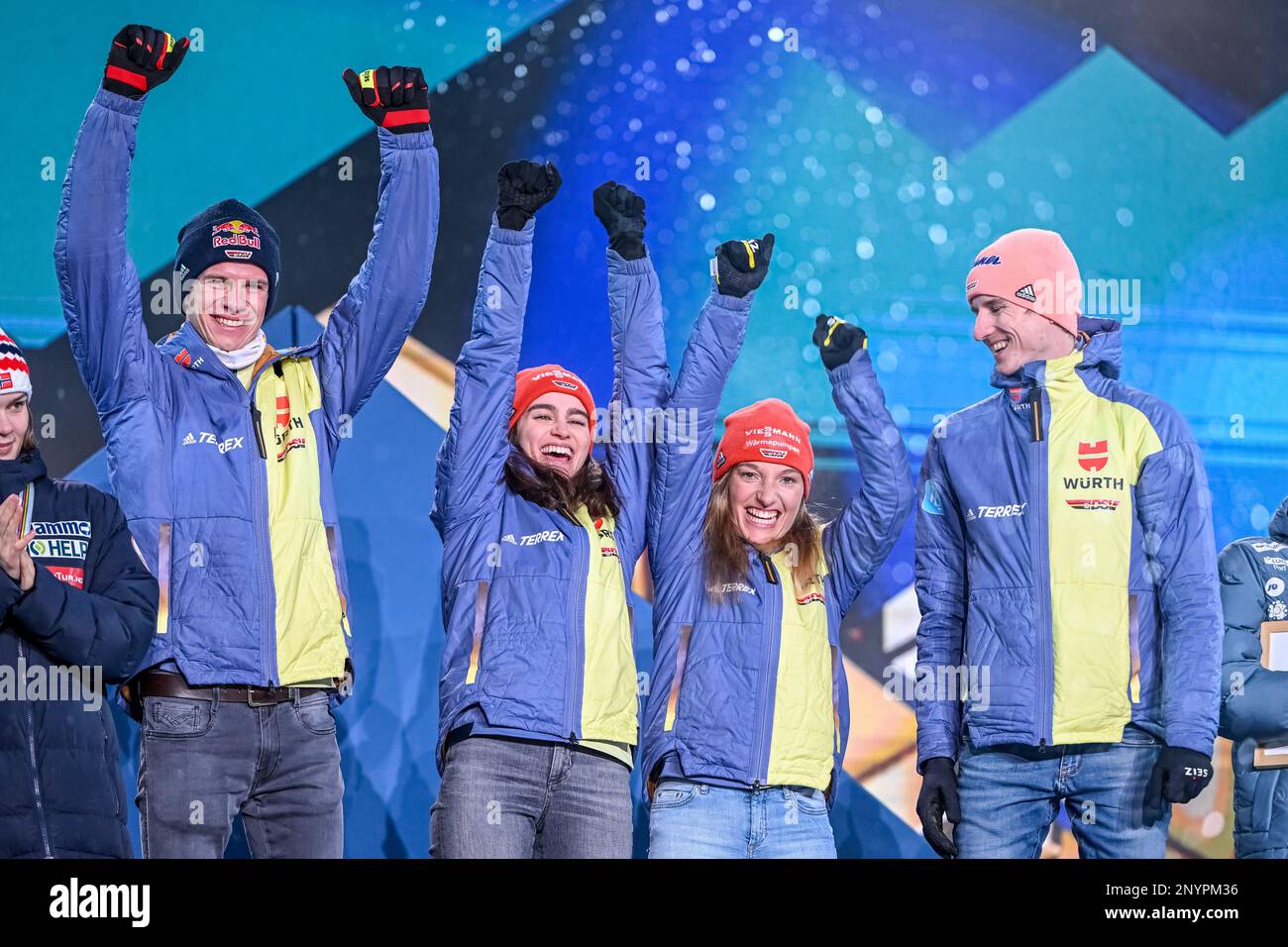 Winner team of Germany on the podium for the Ski Jumping Mixed Team ...