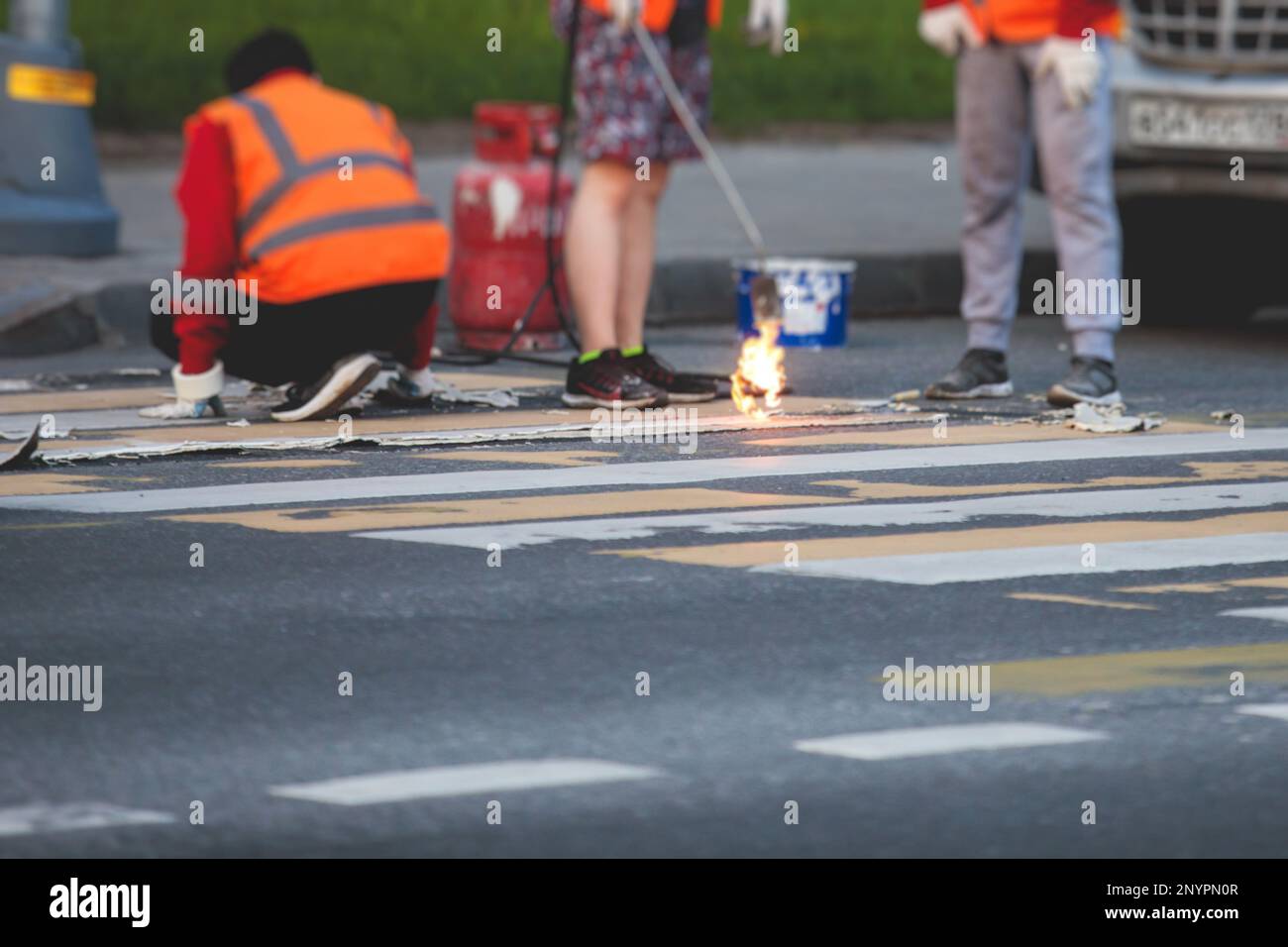 Process of making new road surface markings with a line striping ...