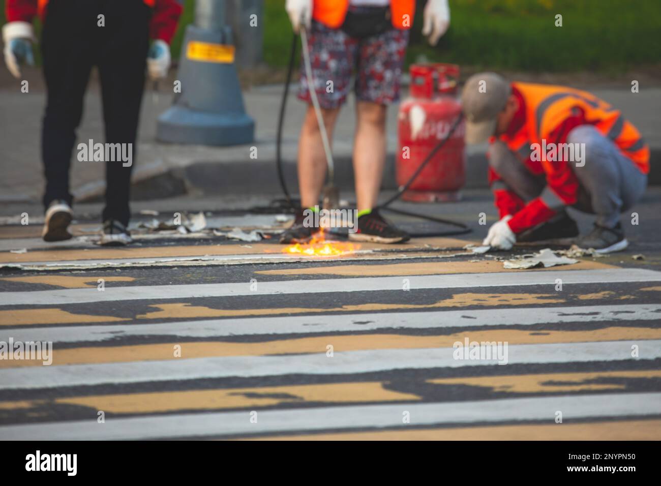 Process of making new road surface markings with a line striping ...