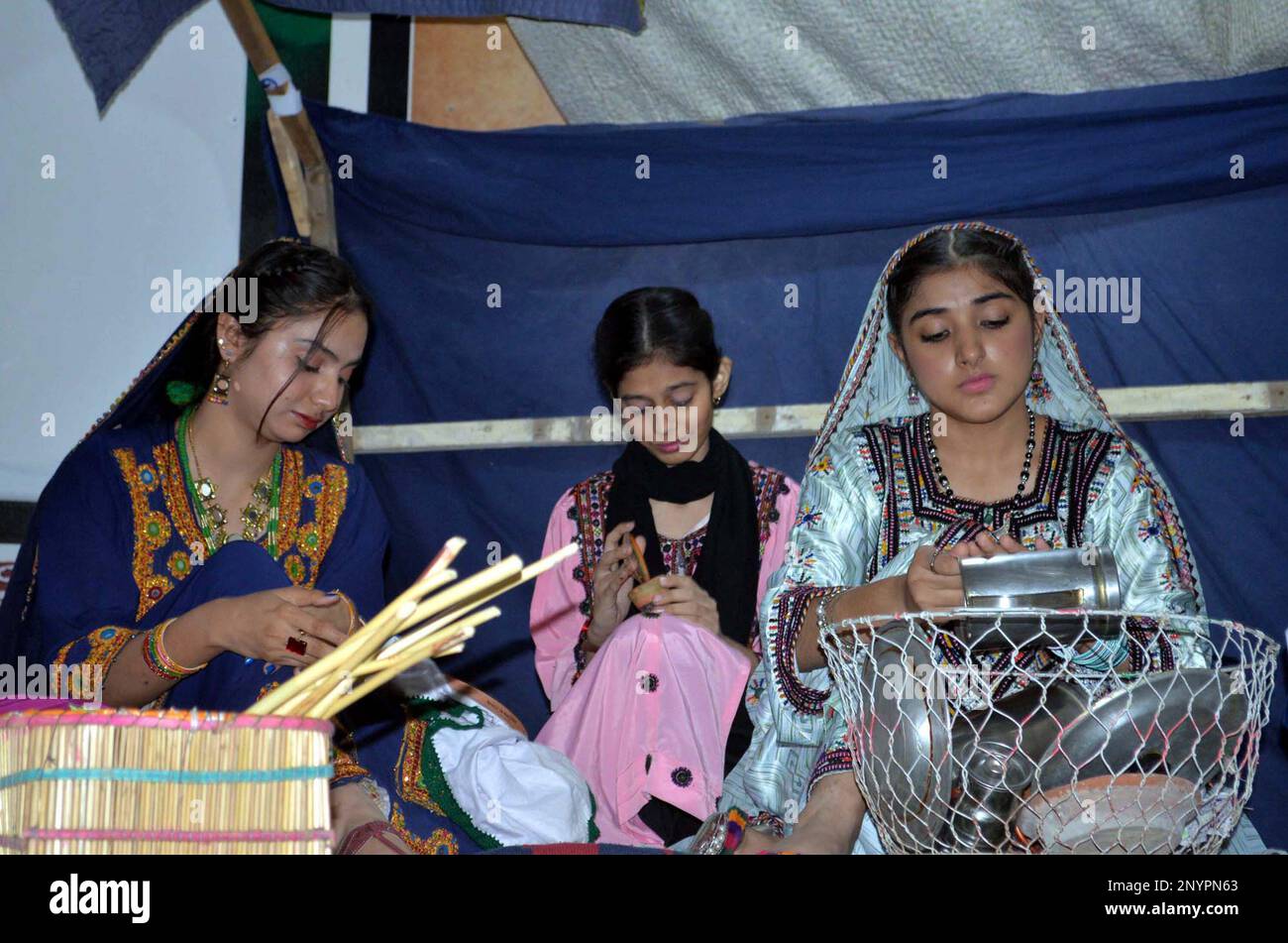 Students are performing tableau on stage during a ceremony held at ...