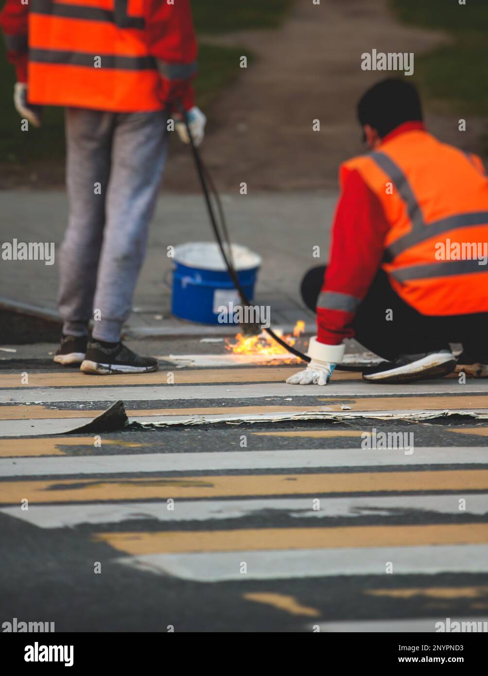 Process of making new road surface markings with a line striping ...