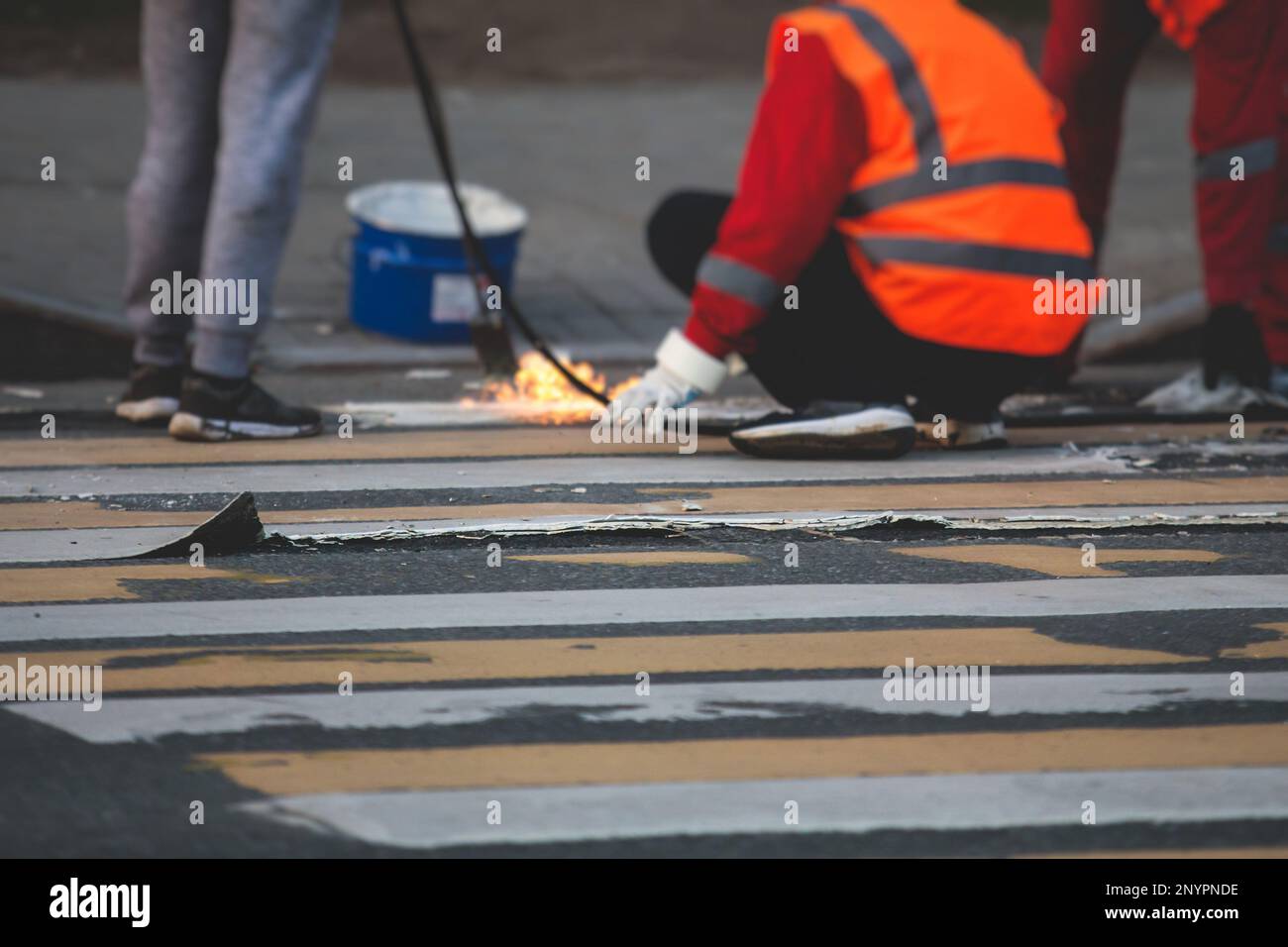 Process of making new road surface markings with a line striping ...