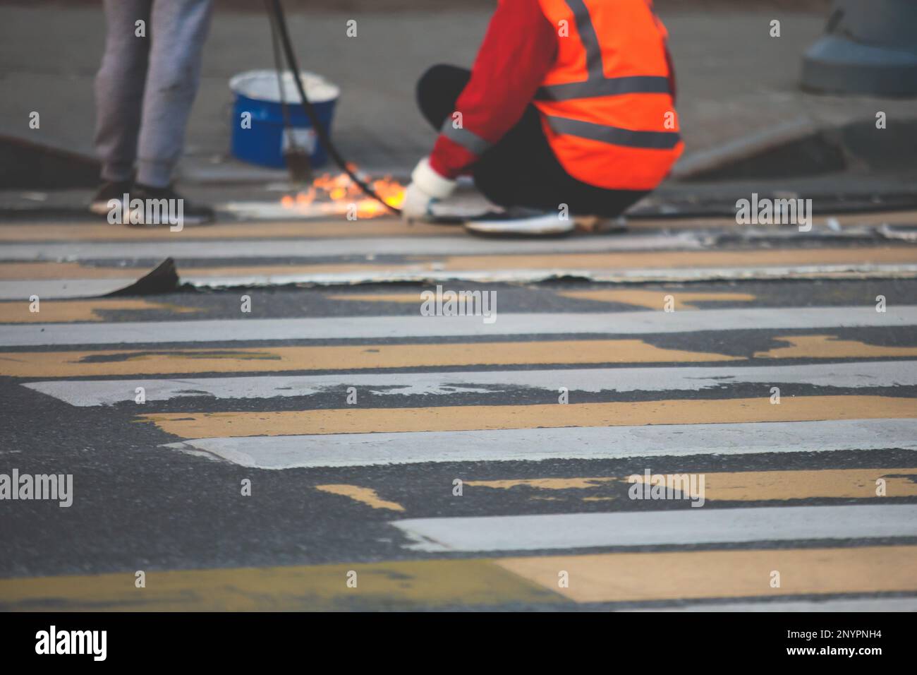 Process of making new road surface markings with a line striping ...
