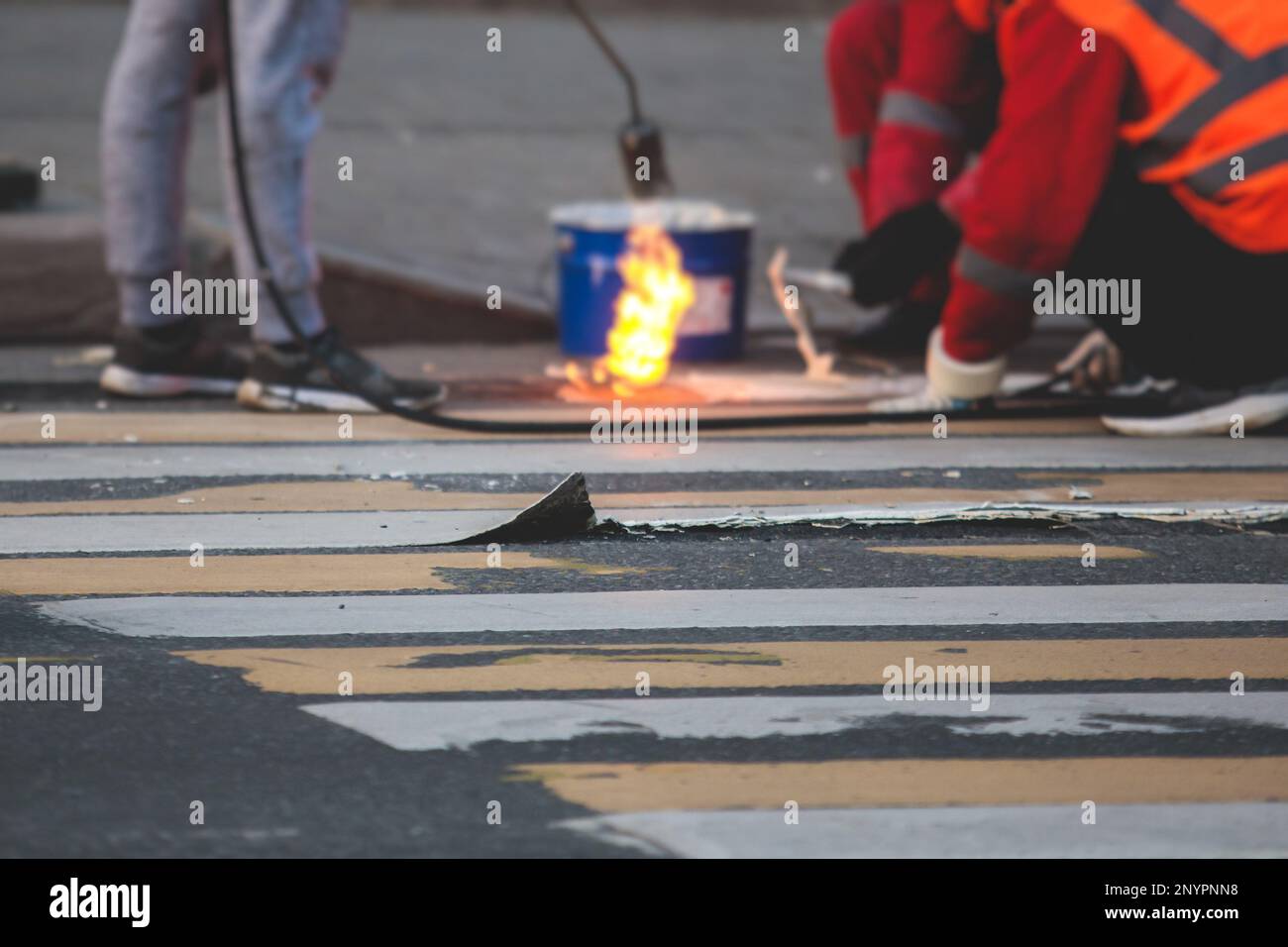 Process of making new road surface markings with a line striping ...