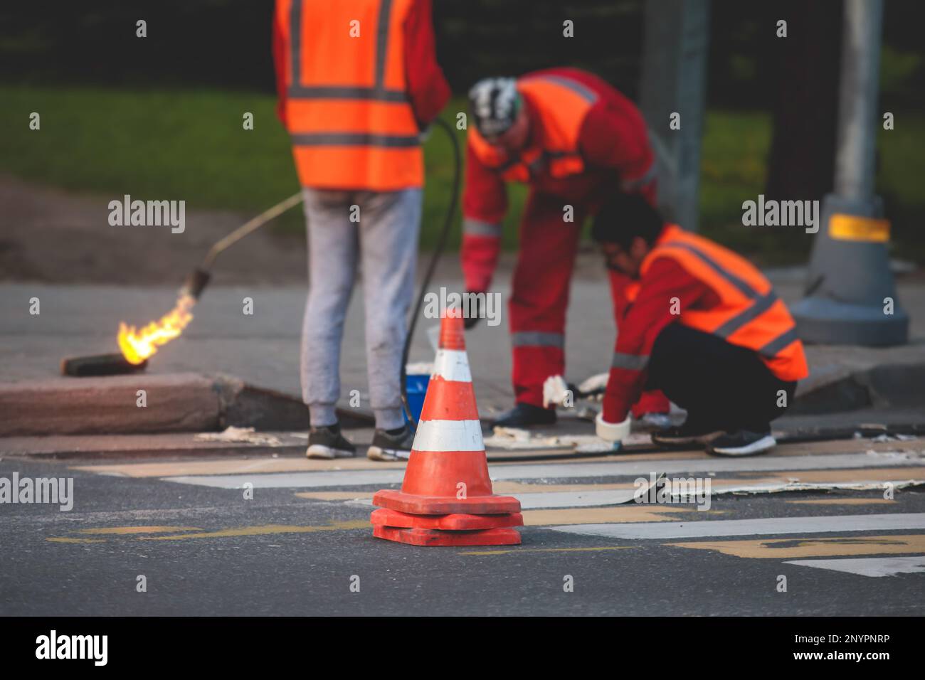 Process of making new road surface markings with a line striping ...