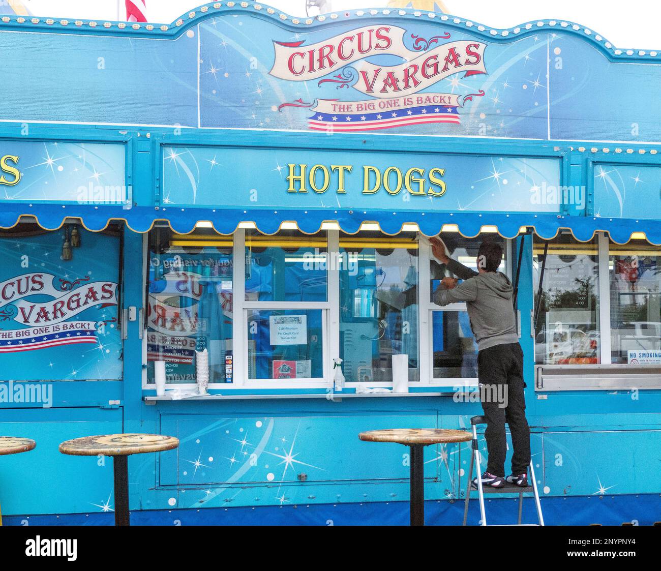 Motorcycle stunt rider Lyubo Karamitrev cleans the concession stand ...
