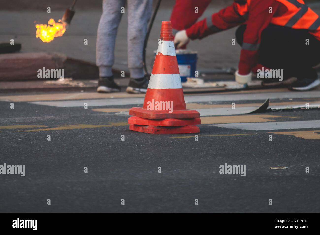 Process of making new road surface markings with a line striping ...