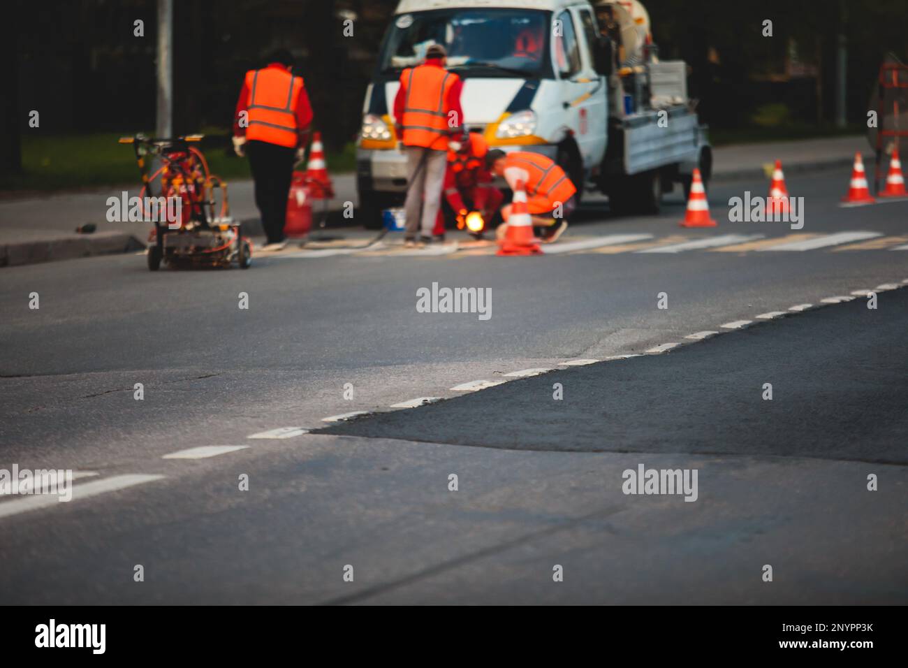 Process of making new road surface markings with a line striping ...