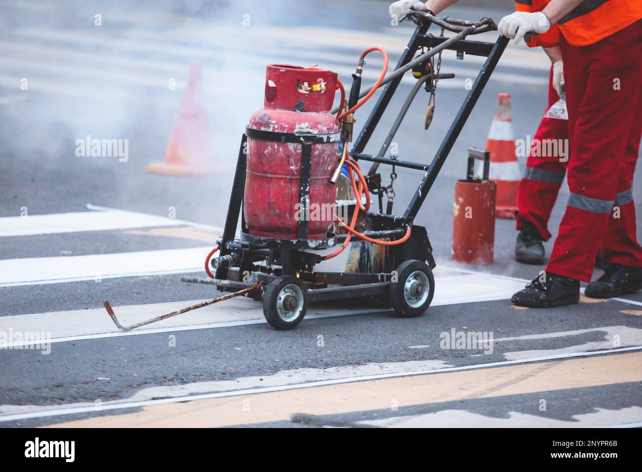 Process of making new road surface markings with a line striping ...
