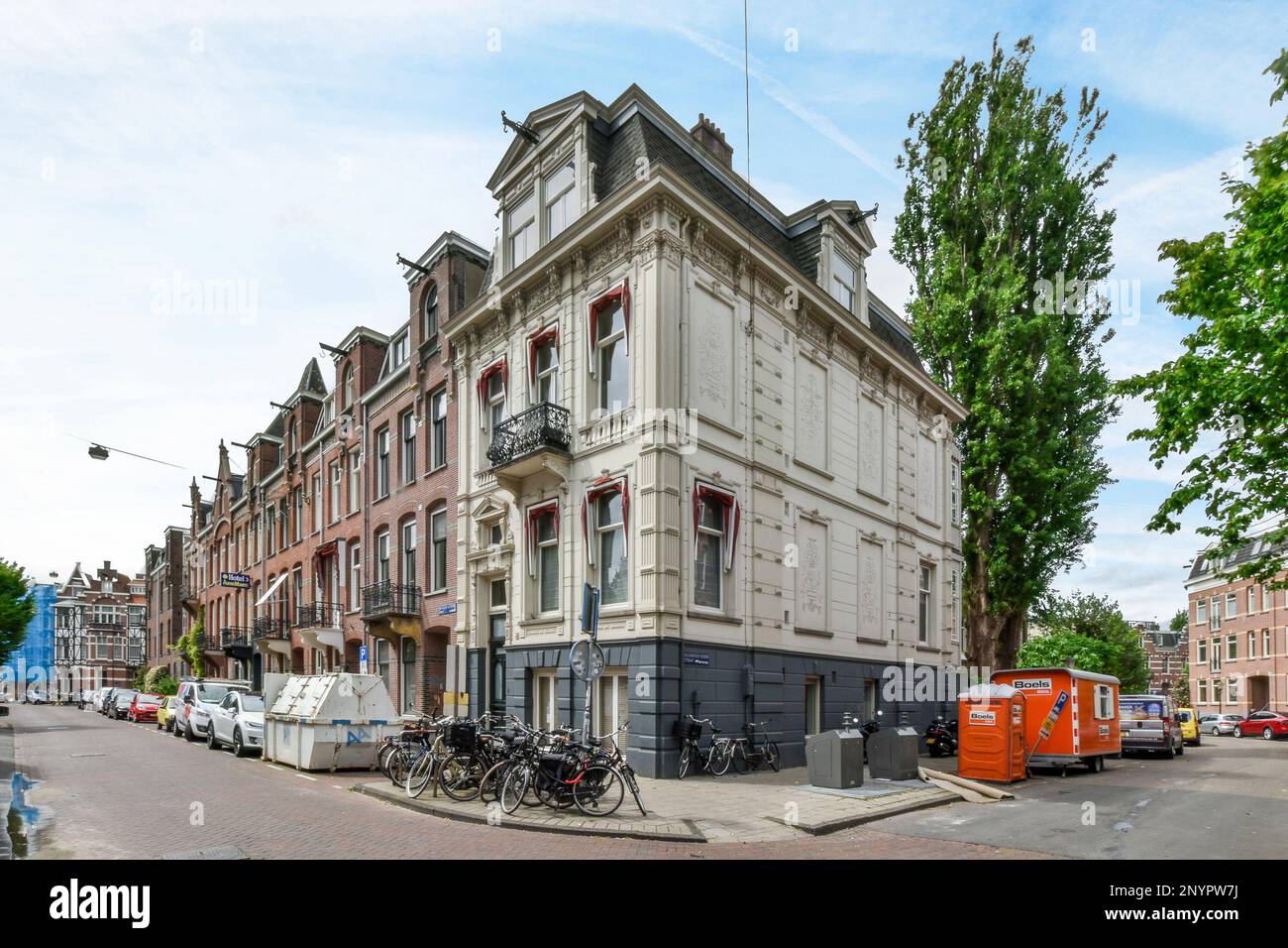 Amsterdam, Netherlands - 10 April, 2021: a city street with buildings ...