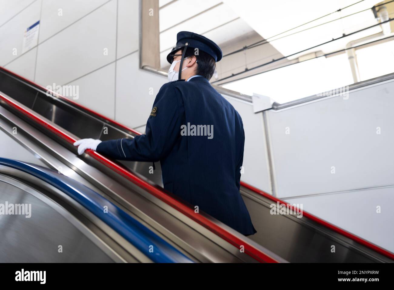 Tokyo, Japan. 2nd Mar, 2023. A train crew employee for Keikyu riding an ...