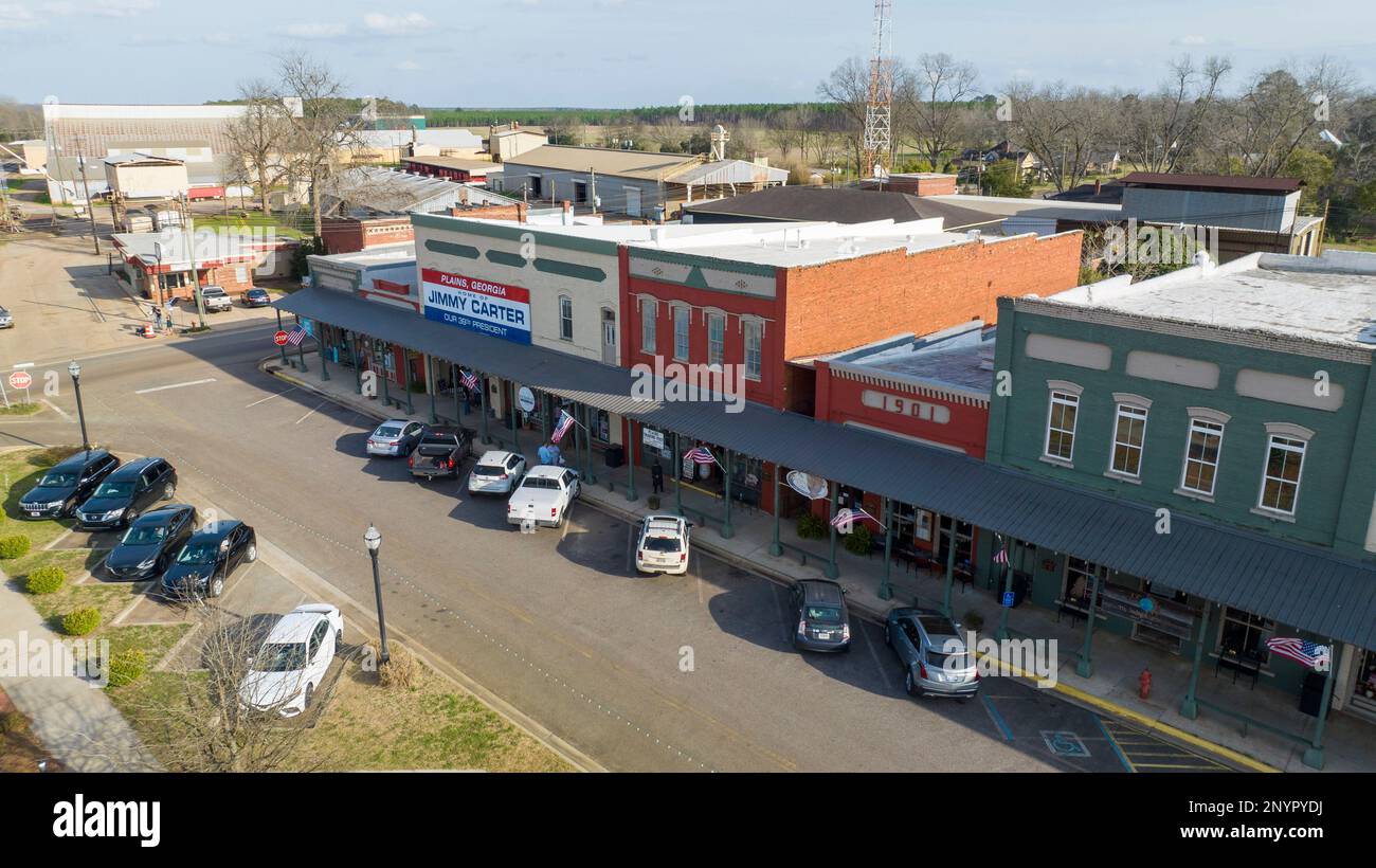 Cars are parked in front of the storefronts on Main Street in Plains ...