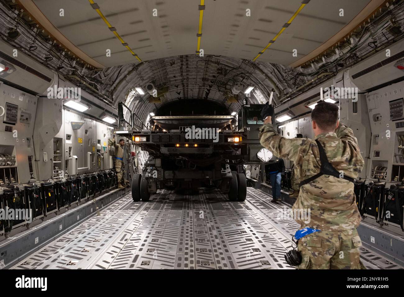 U.S. Air Force Staff Sgt. Anthony Orlando, right, 60th Aerial Port ...