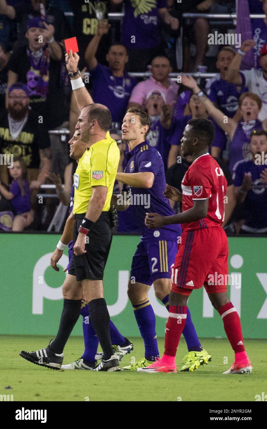 ORLANDO, FL - JUNE 04: Head official Ted Unkel issues a red card on ...