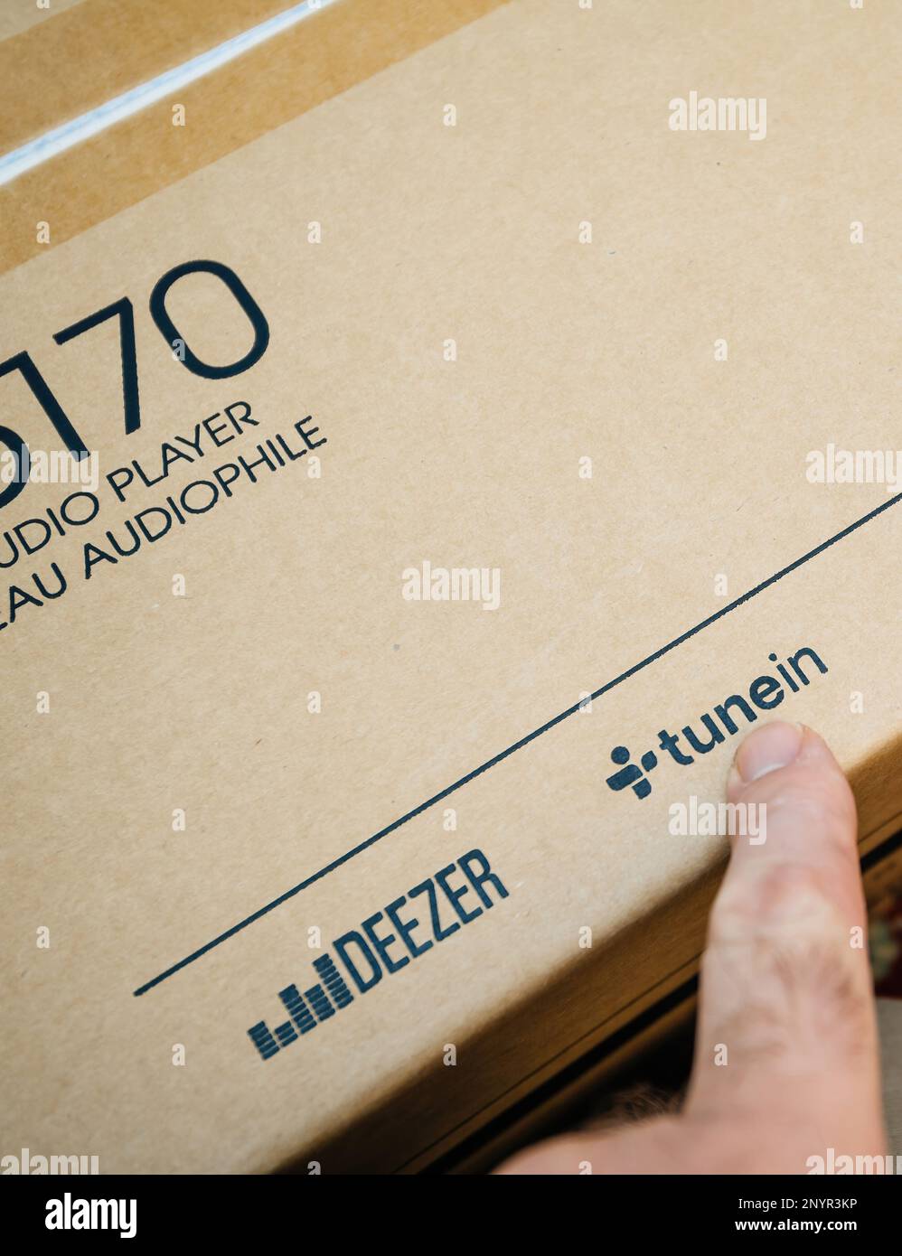 Paris, France - Dec 13, 2022: Cardboard of new Onkyo NS-6170 network audio player with DSD Hi ...