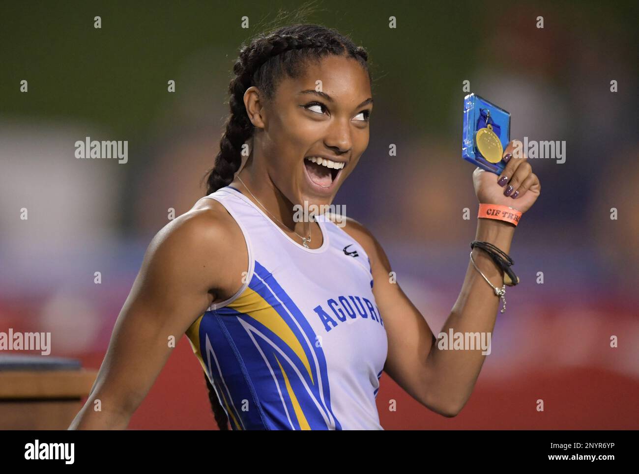 Tara Davis of Agoura poses after winning the girls 100m hurdles, long ...