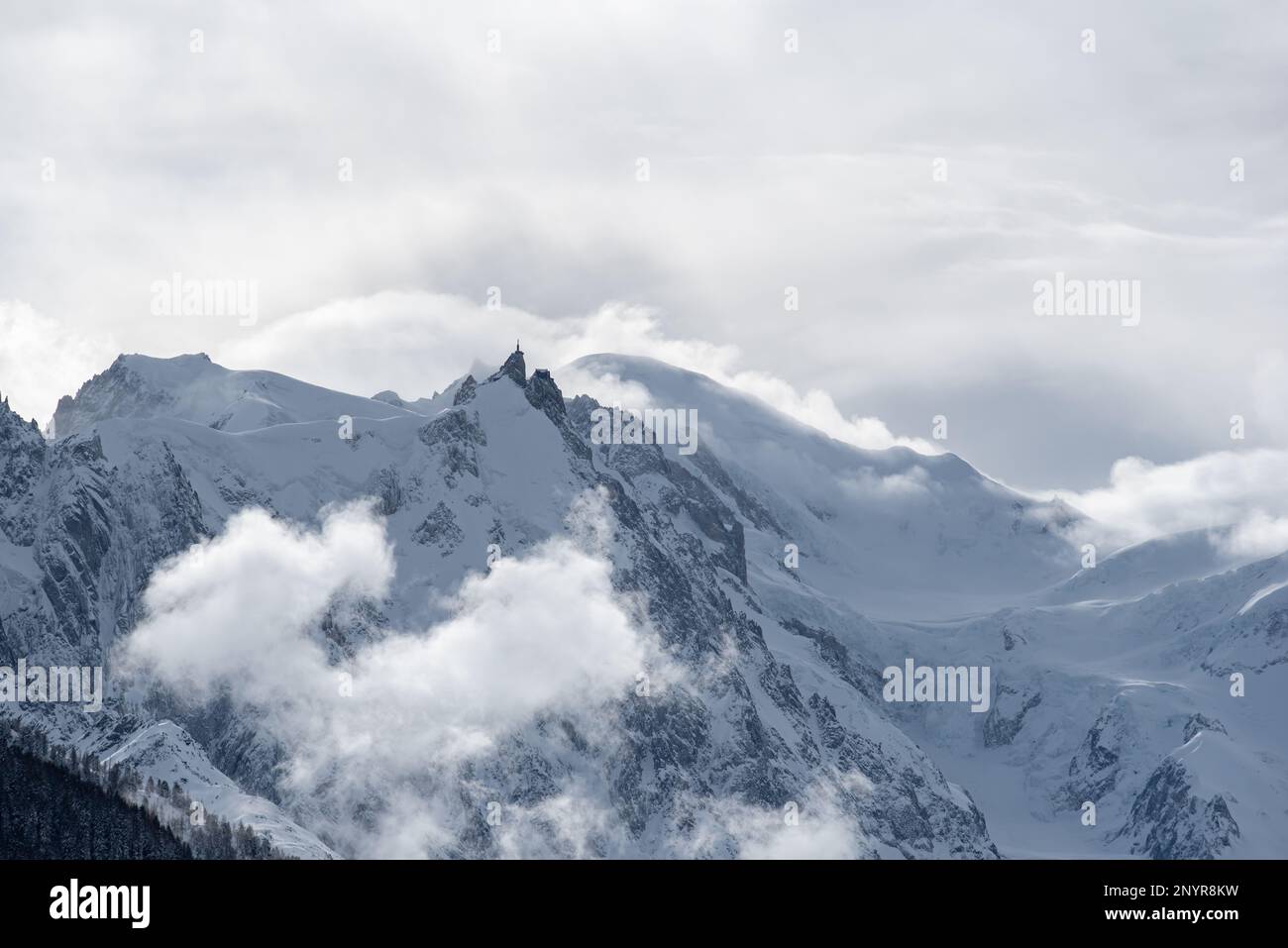 Layers of stormy clouds creating a monochrome view over the Mont Blanc and surrounding mountains ...