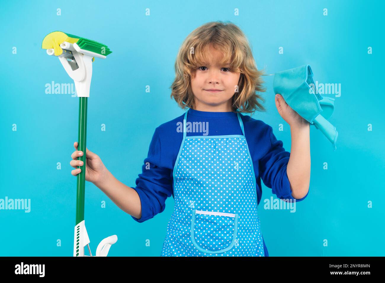Kid helping with housework, cleaning the house. Cleaning accessory ...