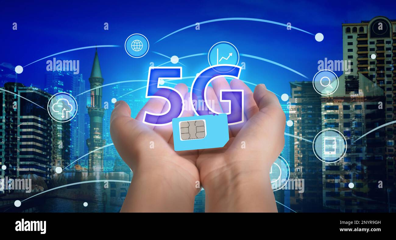 Woman demonstrating 5G SIM card model and cityscape with connection ...