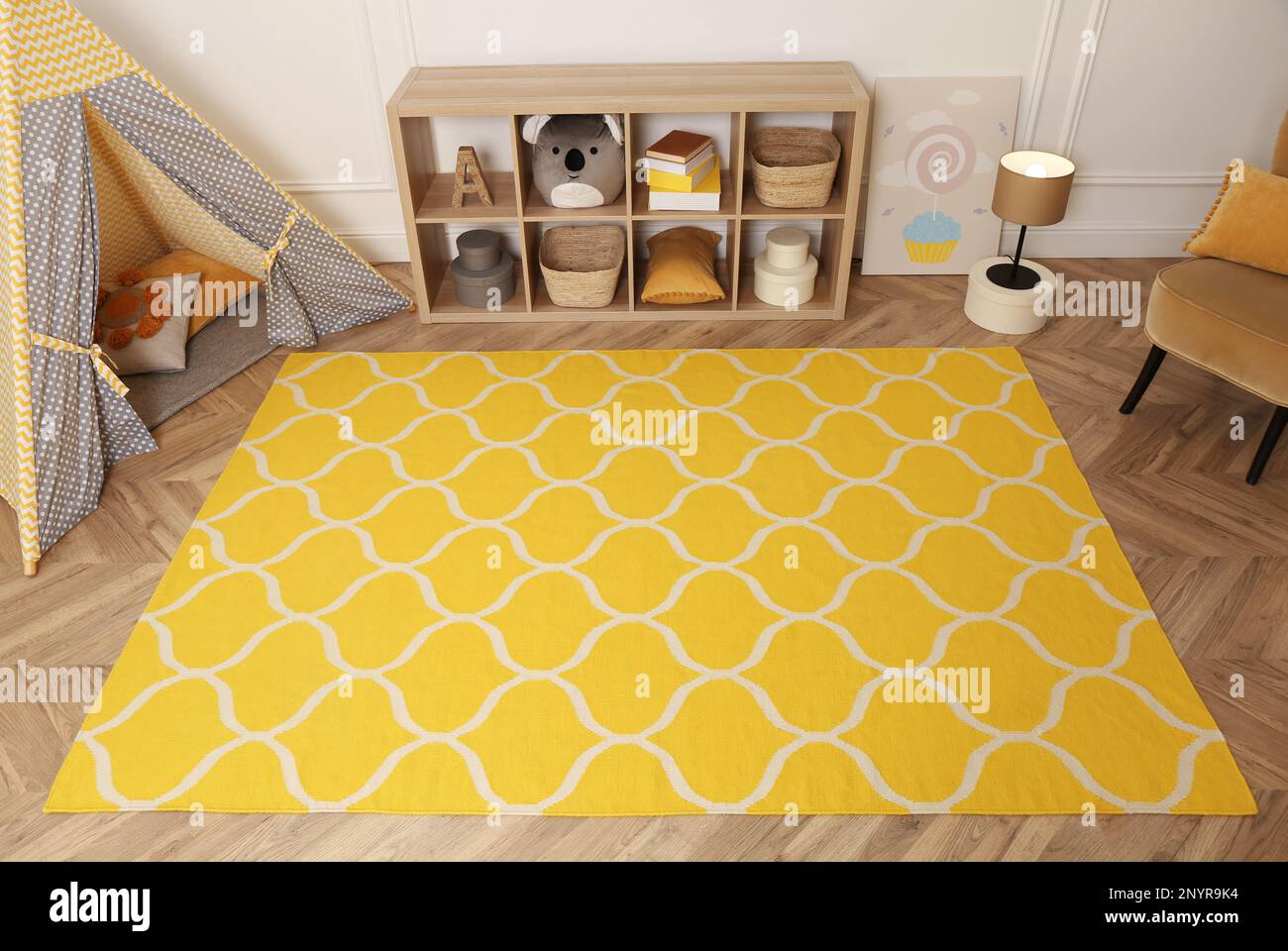 Modern children's room interior with yellow carpet and stylish ...