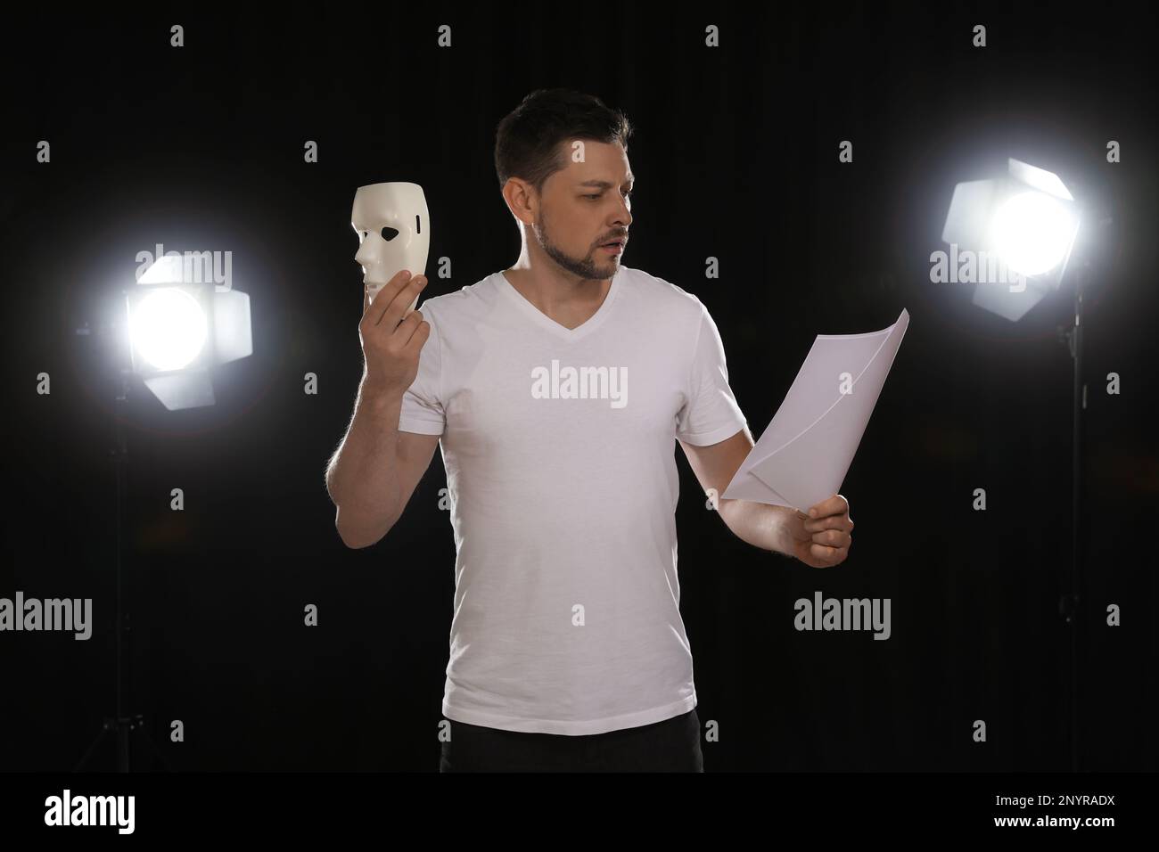 Professional actor reading his script during rehearsal in theatre Stock ...
