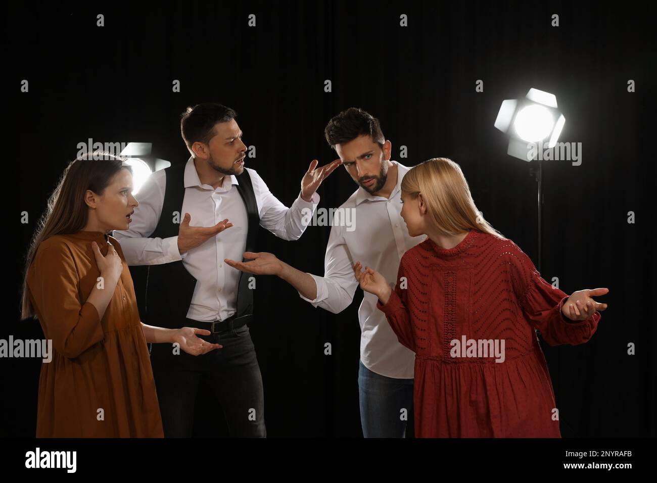 Professional actors rehearsing on stage in theatre Stock Photo - Alamy
