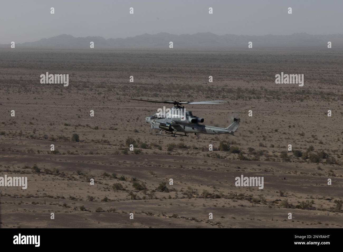 Marines with Marine Light Attack Helicopter Squadron (HMLA) 167 fly an ...