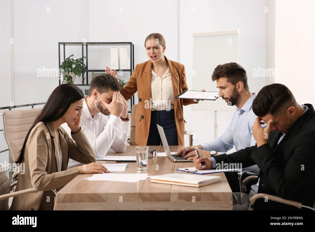 Boss screaming at employees in office. Toxic work environment Stock ...