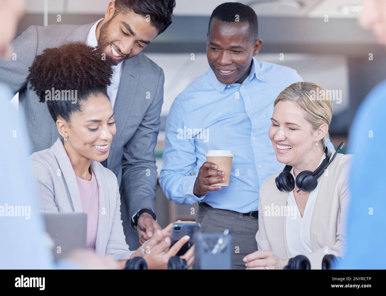 Meeting, phone and group of business people in the office browsing on ...